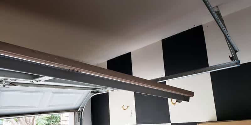 How to Get Garage Door Back on Track: DIY Guide 2024